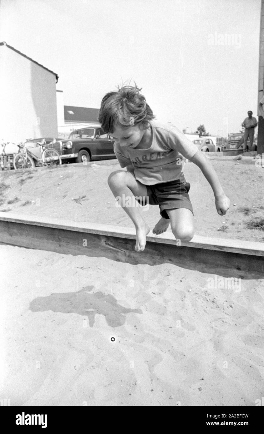 Boy long jump hi-res stock photography and images - Alamy