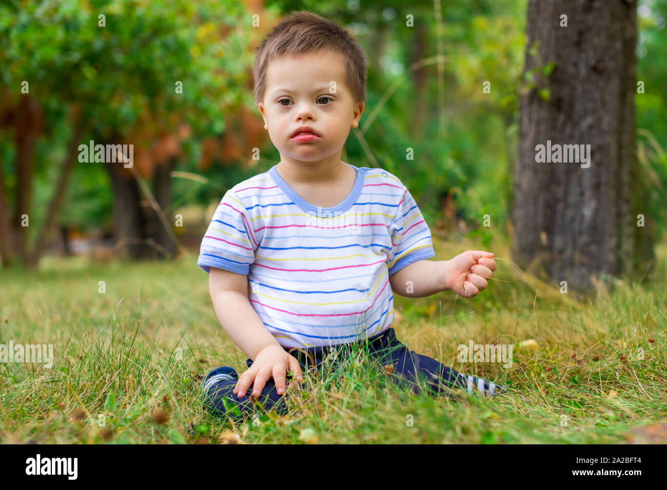 Down syndrome boy child hi-res stock photography and images - Alamy