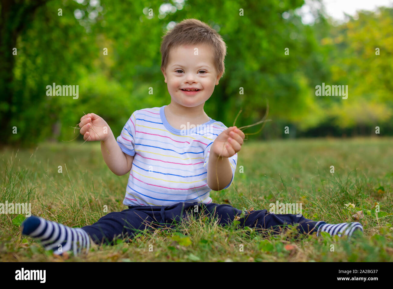 Down syndrome boy child hi-res stock photography and images - Alamy