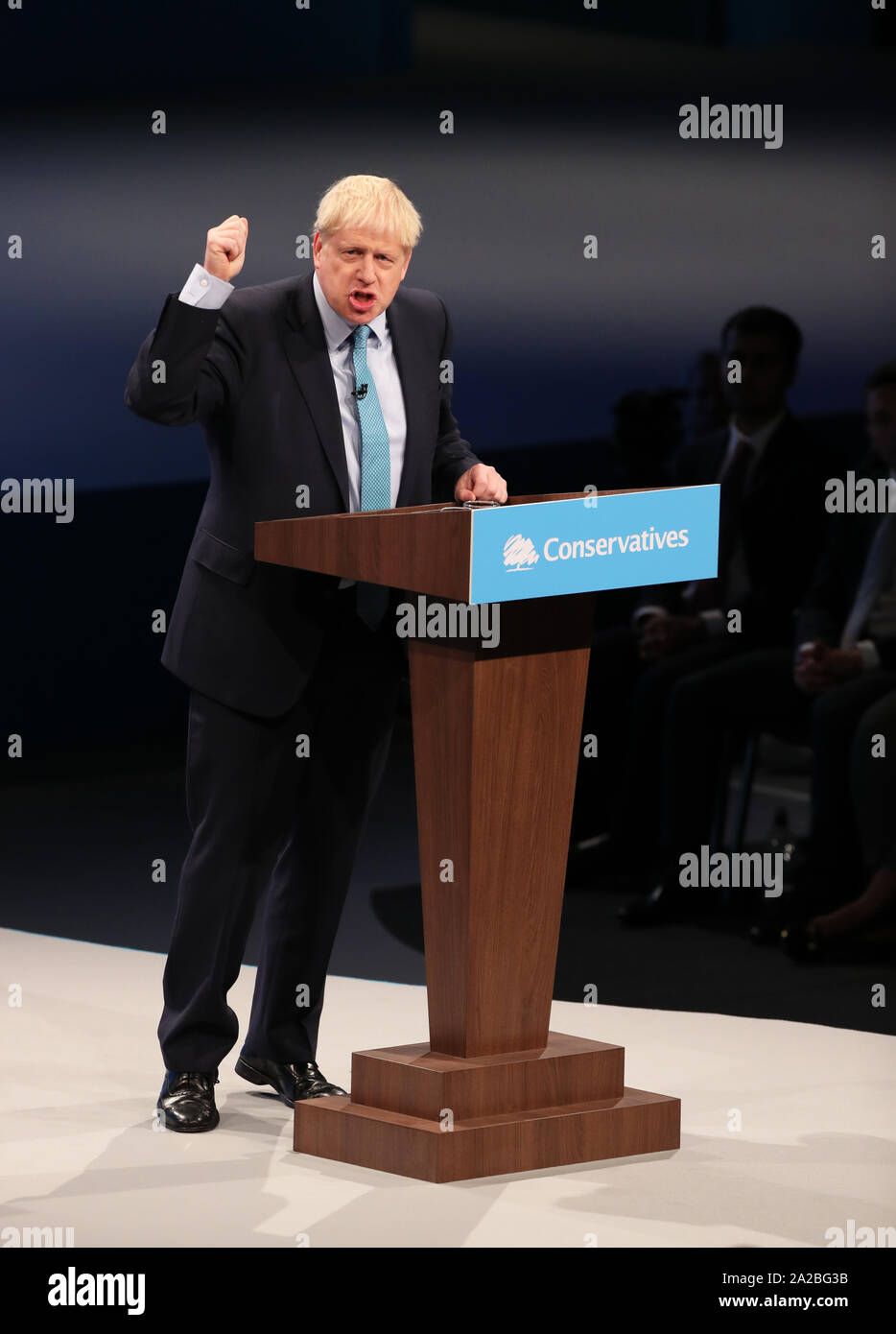 Prime Minister Boris Johnson on stage giving his speech at the ...