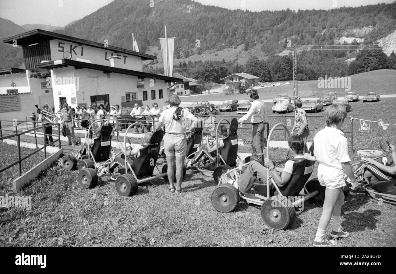 Young people ride "downhill carts", here called "sloper". Here, the ...