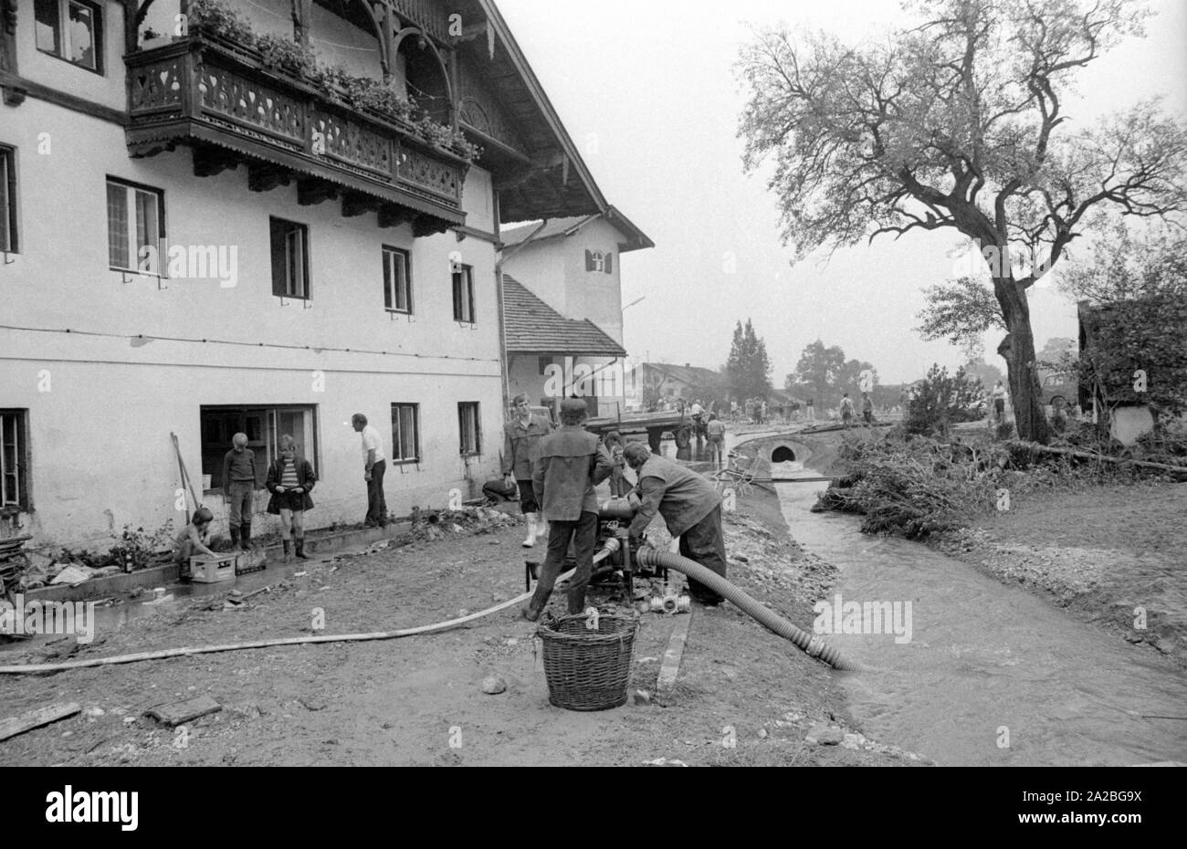 Cleaning-up operations after a heavy storm in a place on the Chiemsee ...