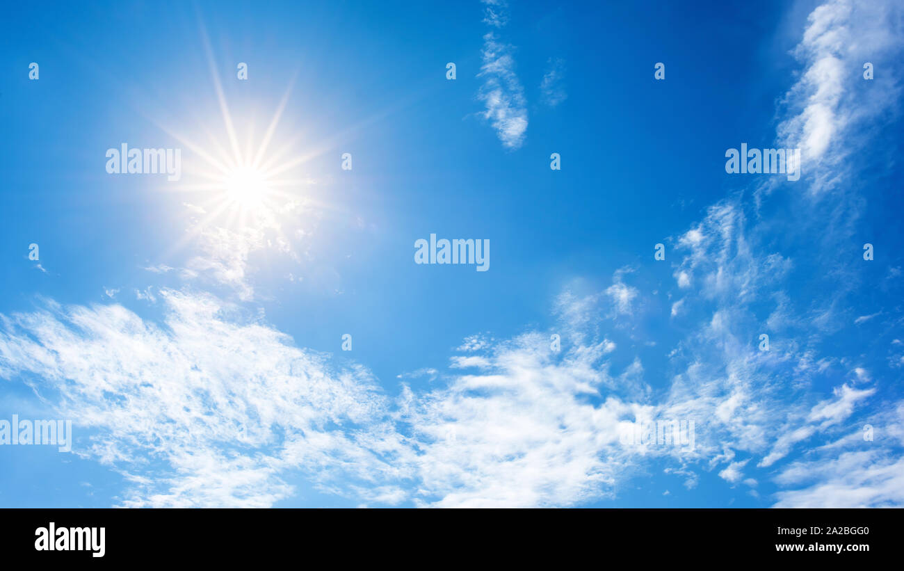 Sun and blue sky Stock Photo - Alamy