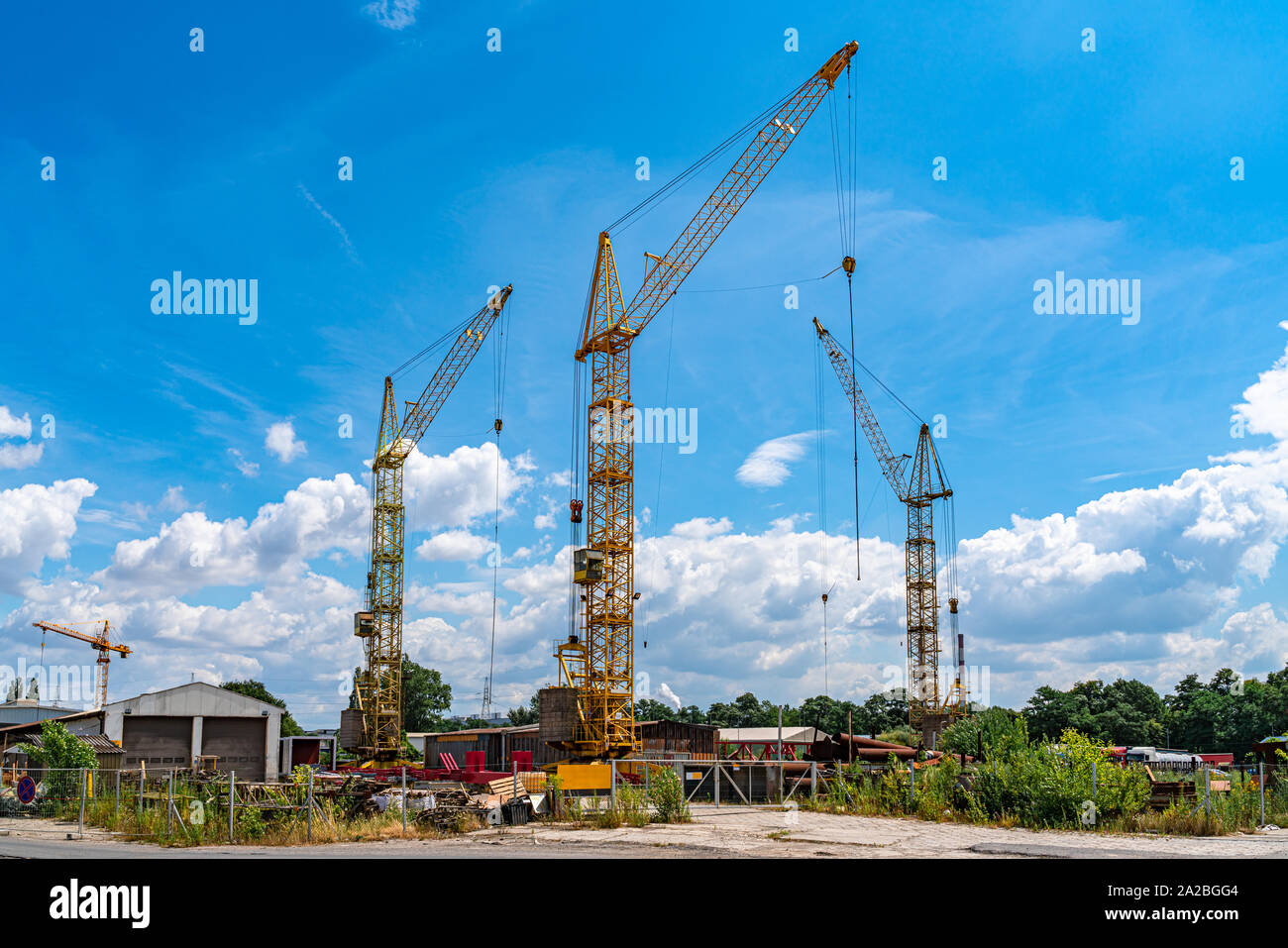 Cranes during work during loading Stock Photo - Alamy
