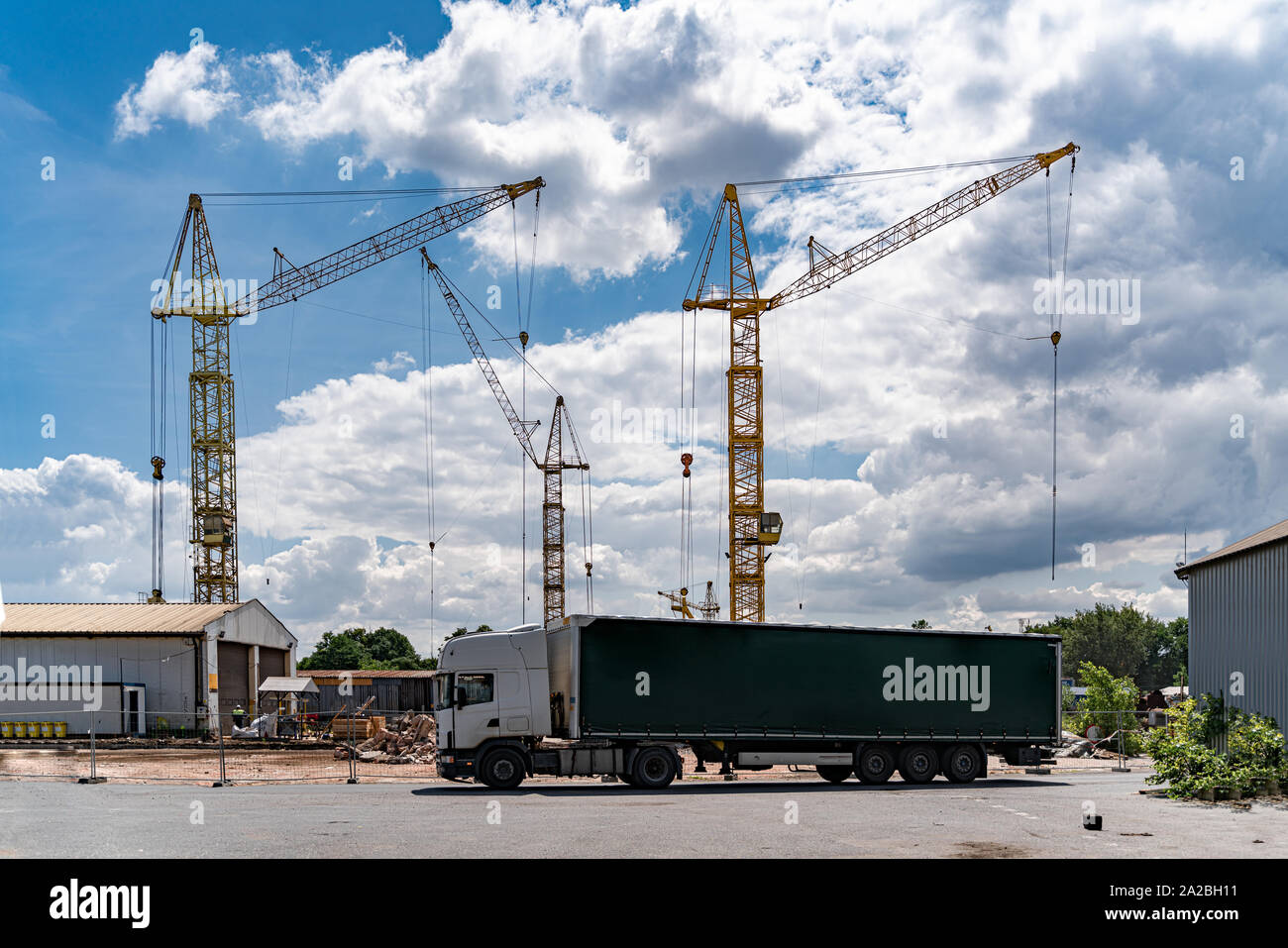 Cranes during work during loading Stock Photo - Alamy