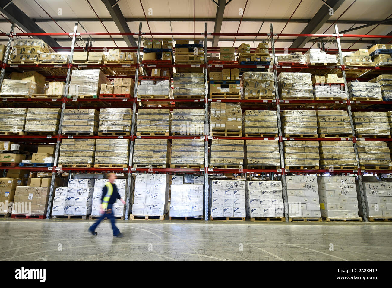 Warehouse huge racking pallets of medical supplies hi-res stock ...