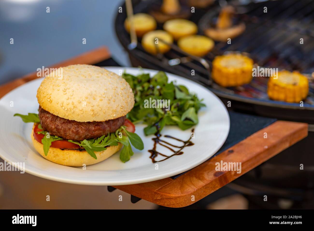 Beef burger eating hi-res stock photography and images - Alamy