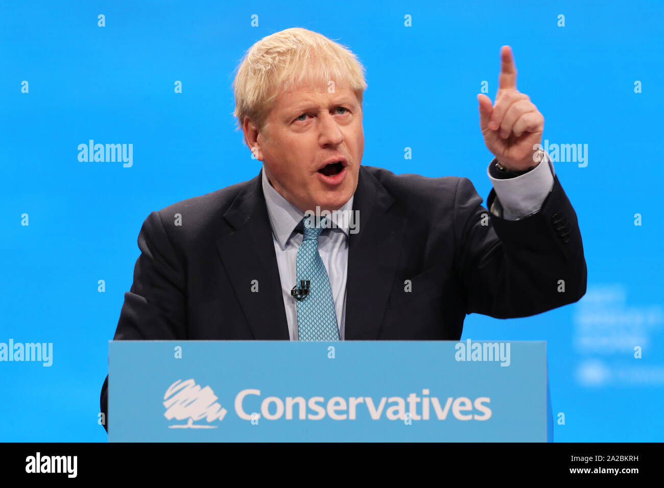 Prime Minister Boris Johnson on stage giving his speech at the ...