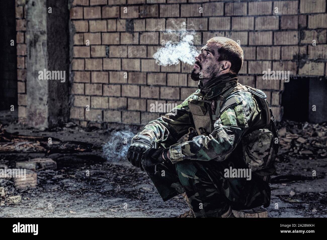 Man army uniform smoking hi-res stock photography and images - Alamy