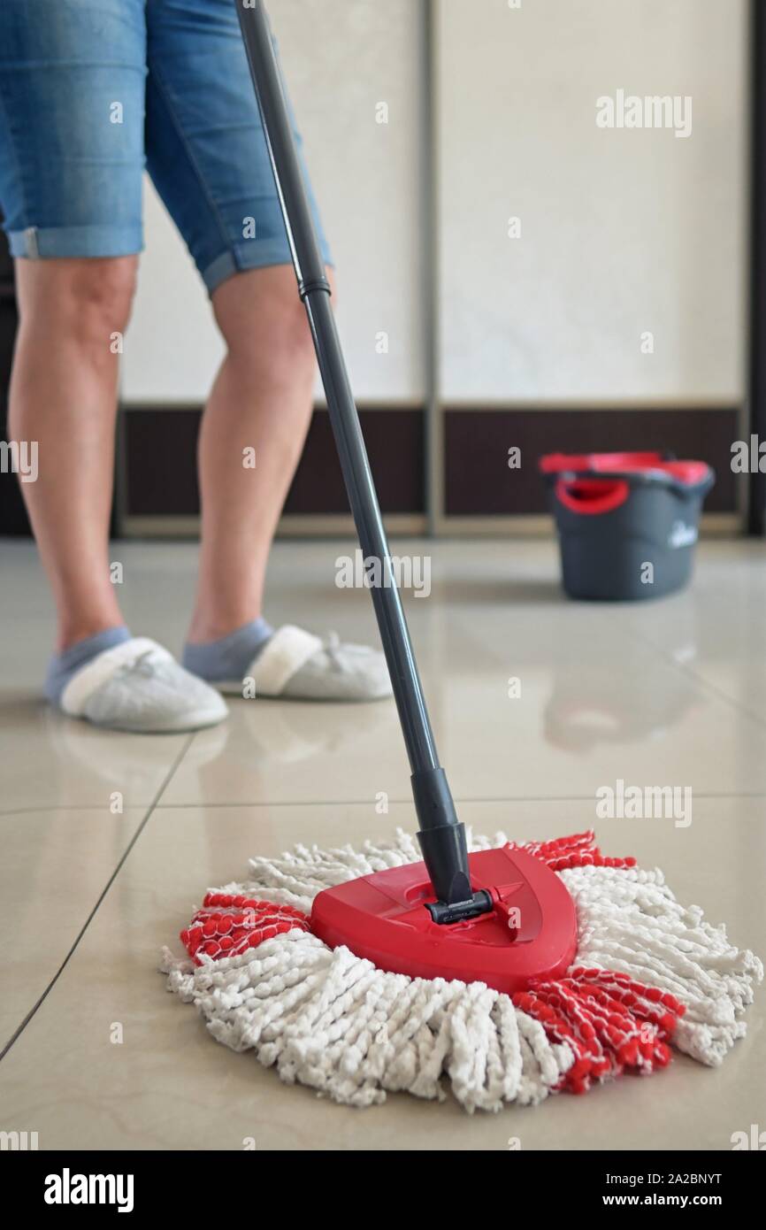 Close up woman mop cleaning hi-res stock photography and images - Alamy