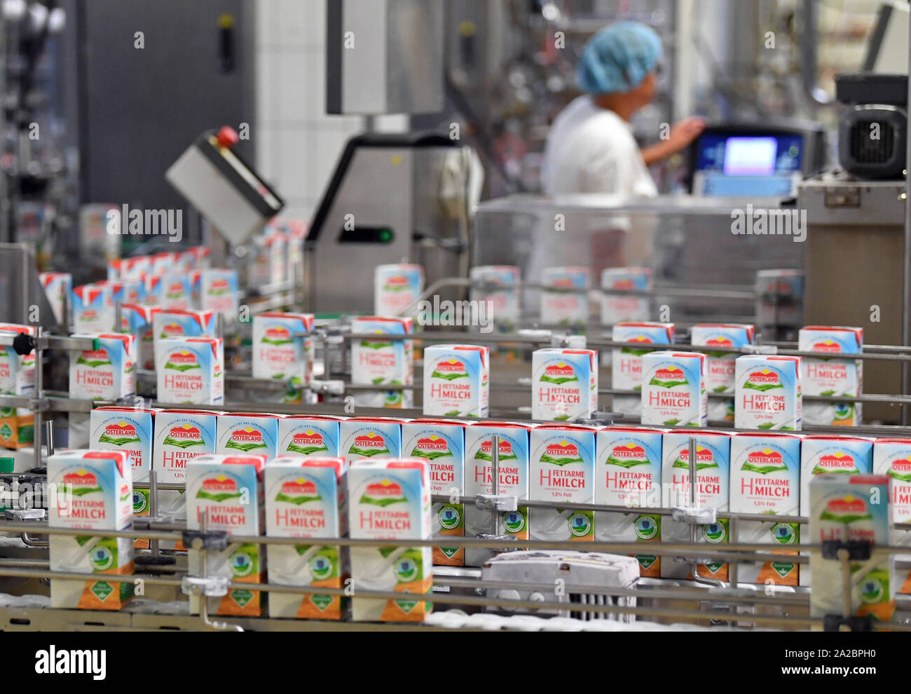 Erfurt, Germany. 02nd Oct, 2019. Low-fat UHT milk is filled into ...