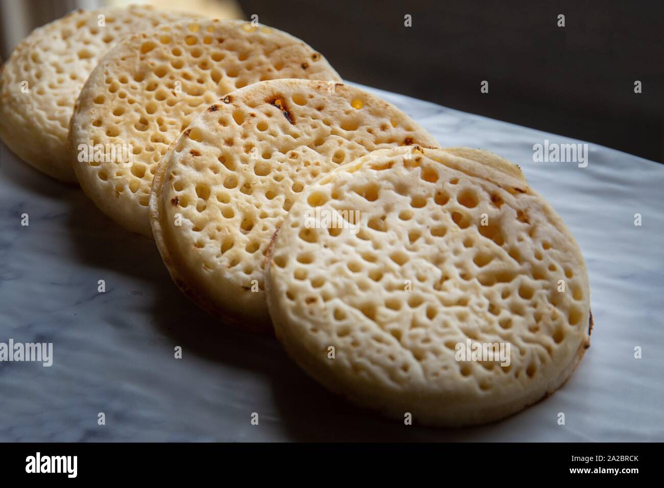 English hot toasted crumpets hi-res stock photography and images - Alamy