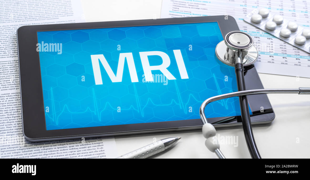 The word MRI on the display of a tablet Stock Photo - Alamy