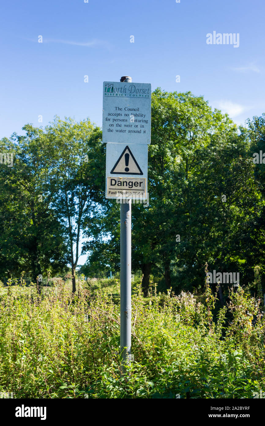 Danger warning sign "fast moving water" UK Stock Photo - Alamy