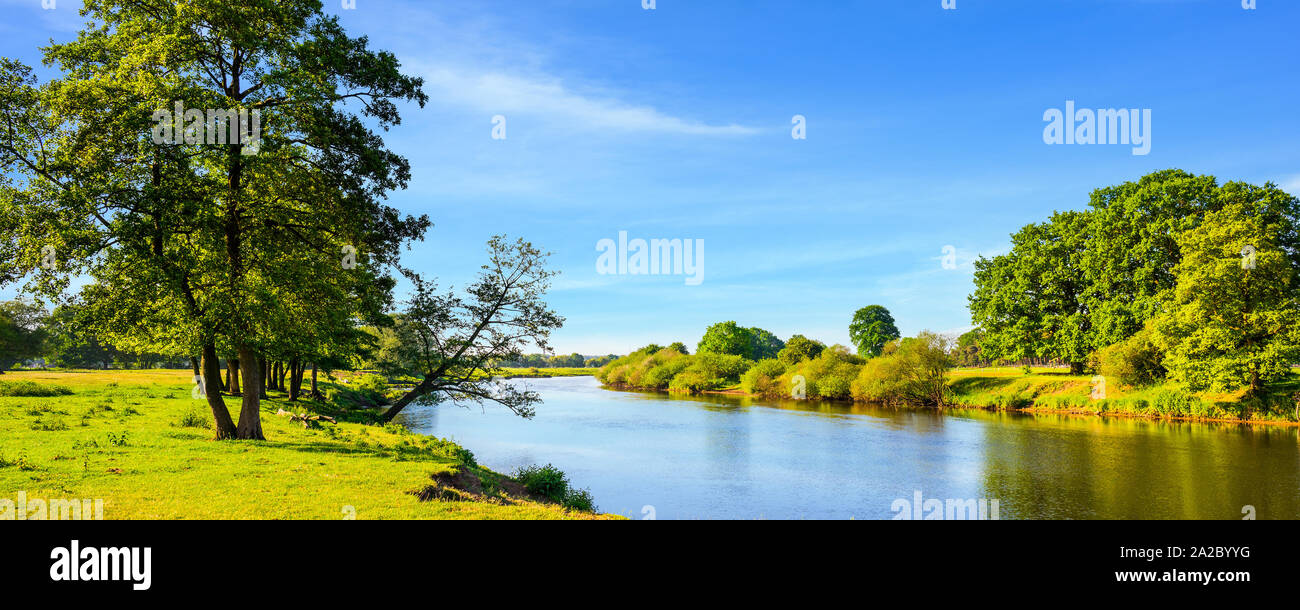 Summer landscape with river at sunset Stock Photo - Alamy