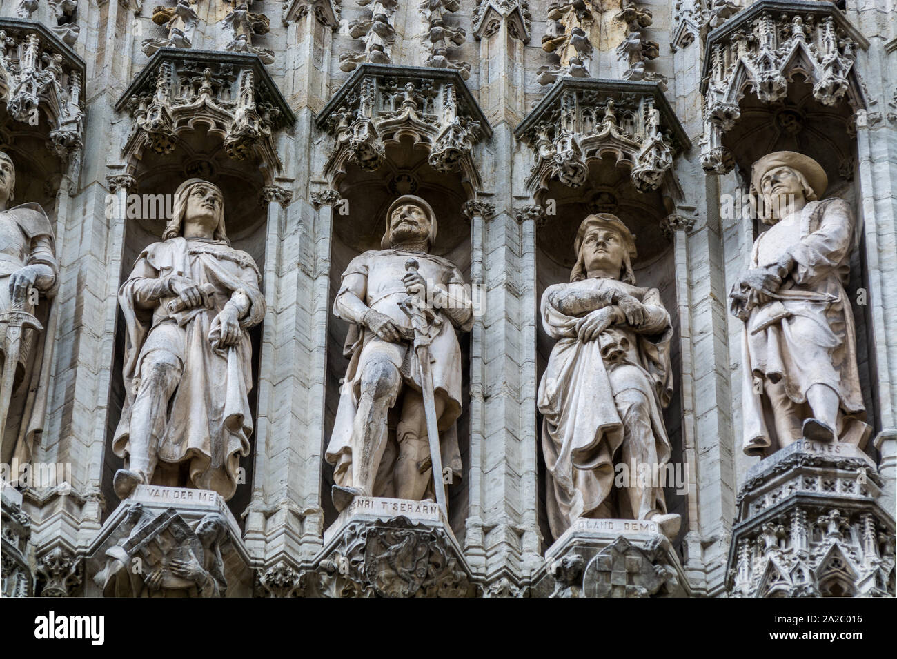 Medieval statues on historical facade of City Hall on Grand Place in ...