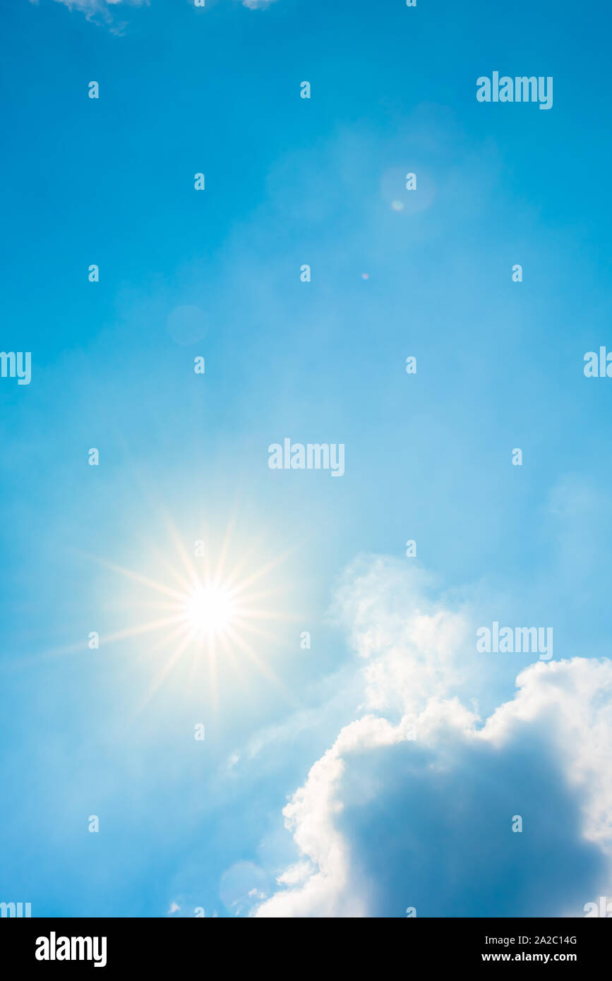 Sunny background, wonderful blue sky with bright sun Stock Photo - Alamy