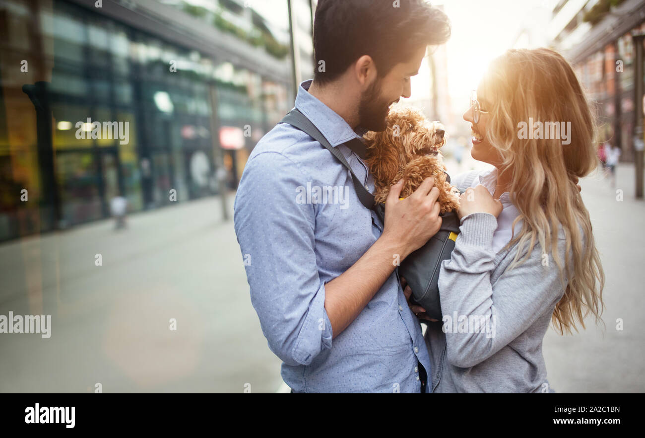 Happy couple dating on sunny day in the city Stock Photo - Alamy