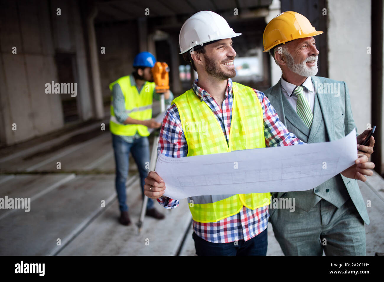 Group of construction engineer working in construction site Stock Photo ...