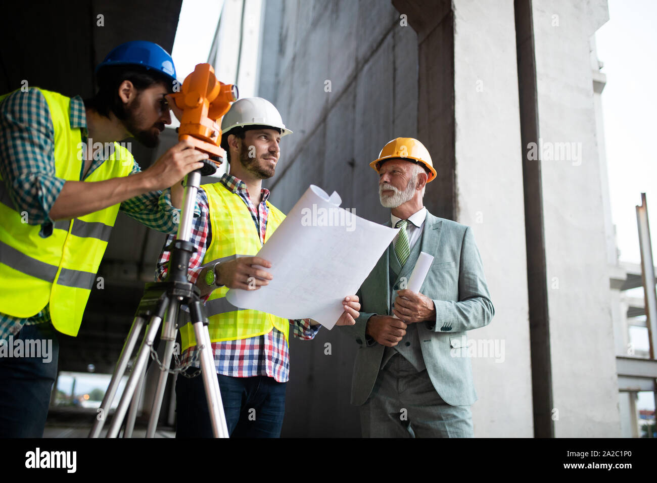 Group of construction engineer working in construction site Stock Photo ...