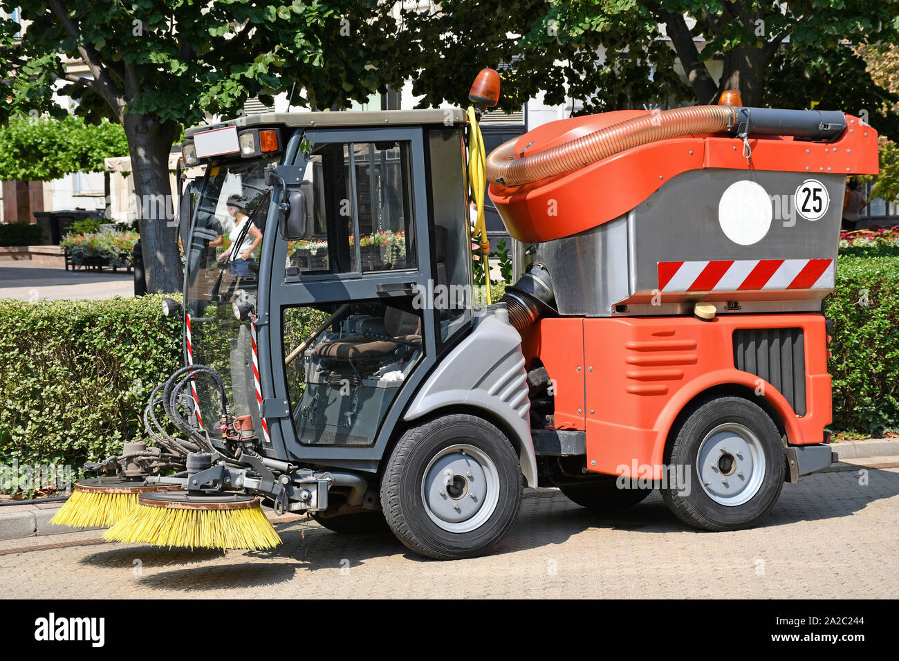 Street cleaner orange vehicle hi-res stock photography and images - Alamy