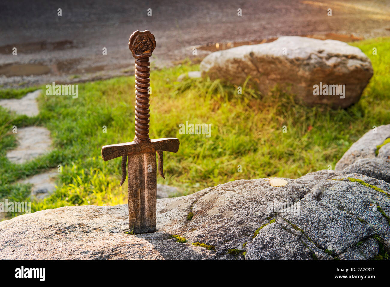 Excalibur, King Arthur's sword in the stone. Edged weapons from the ...