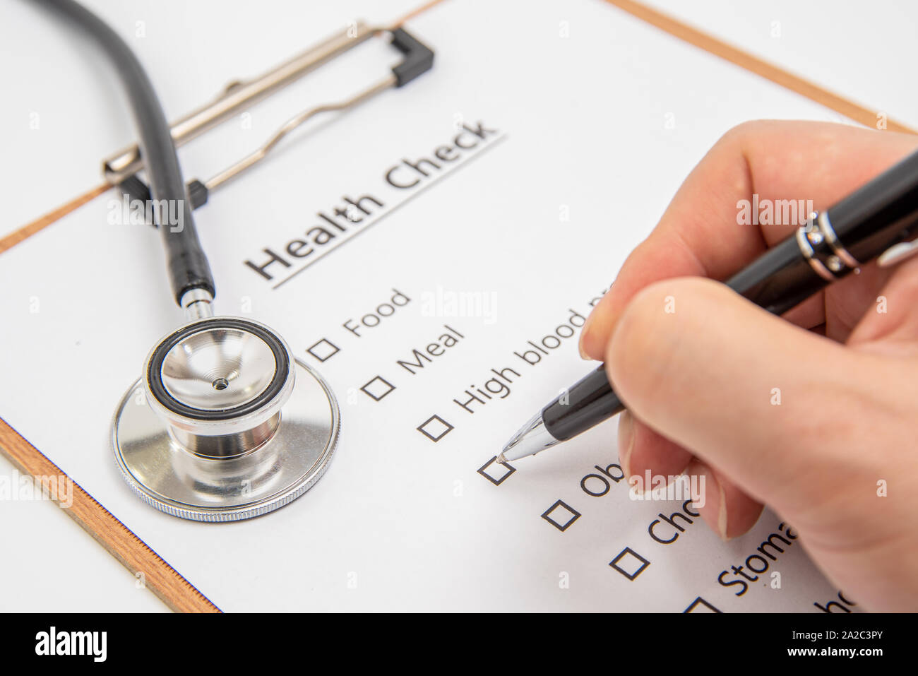 Health concept with clipboard and health check related items Stock ...