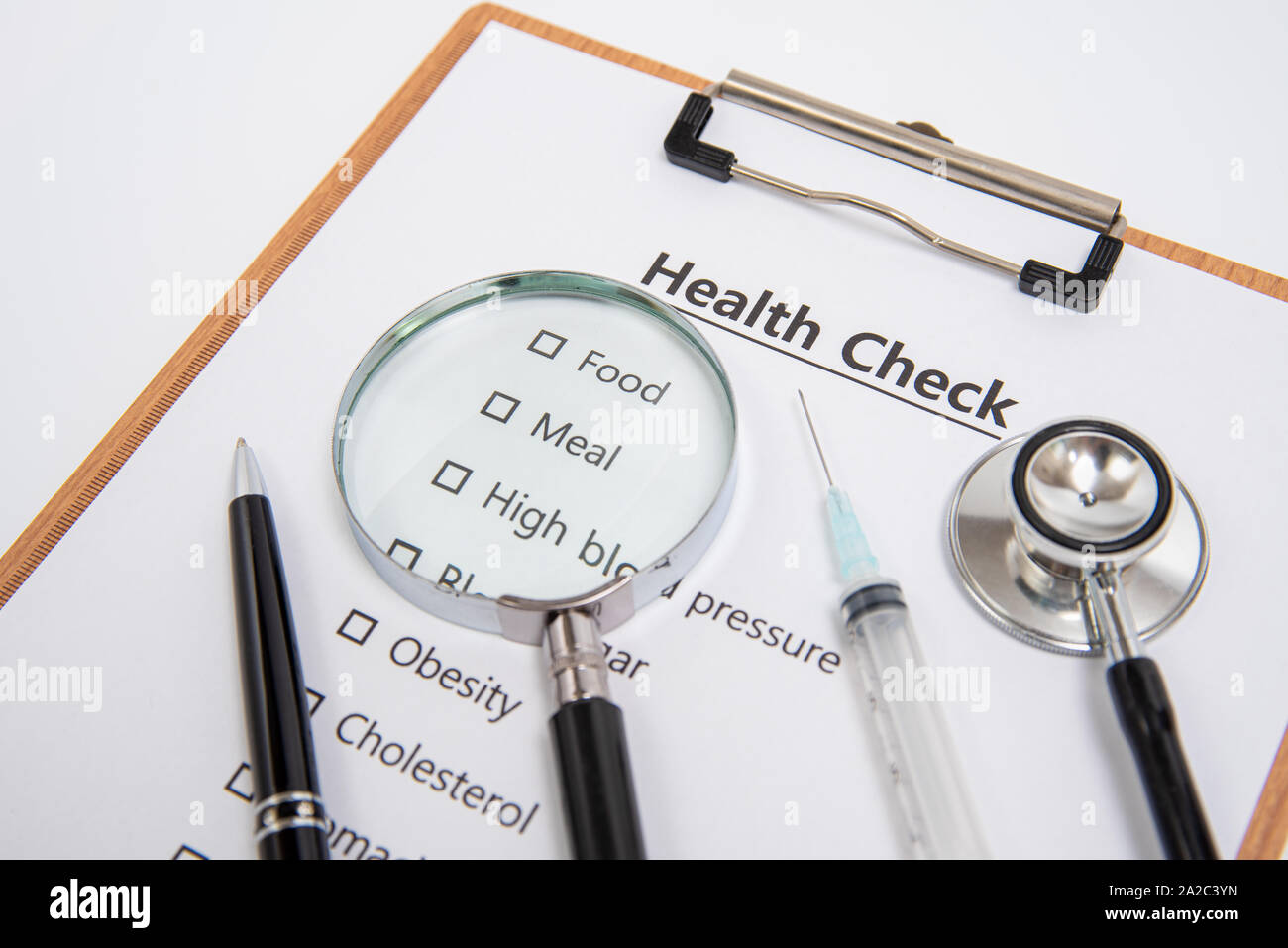 Health concept with clipboard and health check related items Stock ...