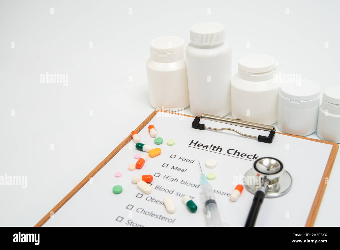 Health concept with clipboard and health check related items Stock ...