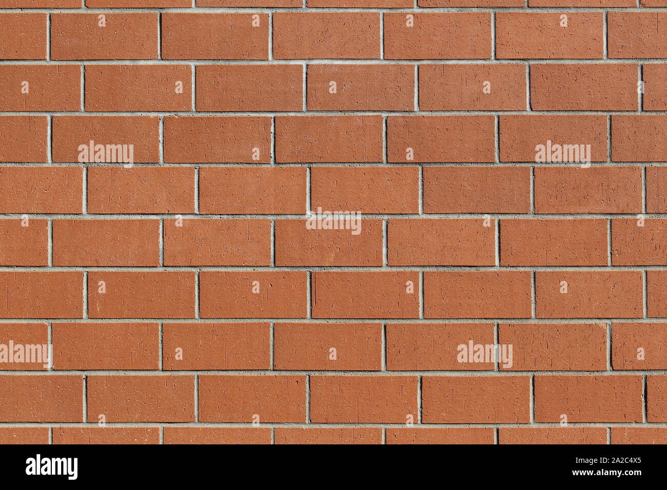 Close up of a new and clean brick wall for use as background or ...