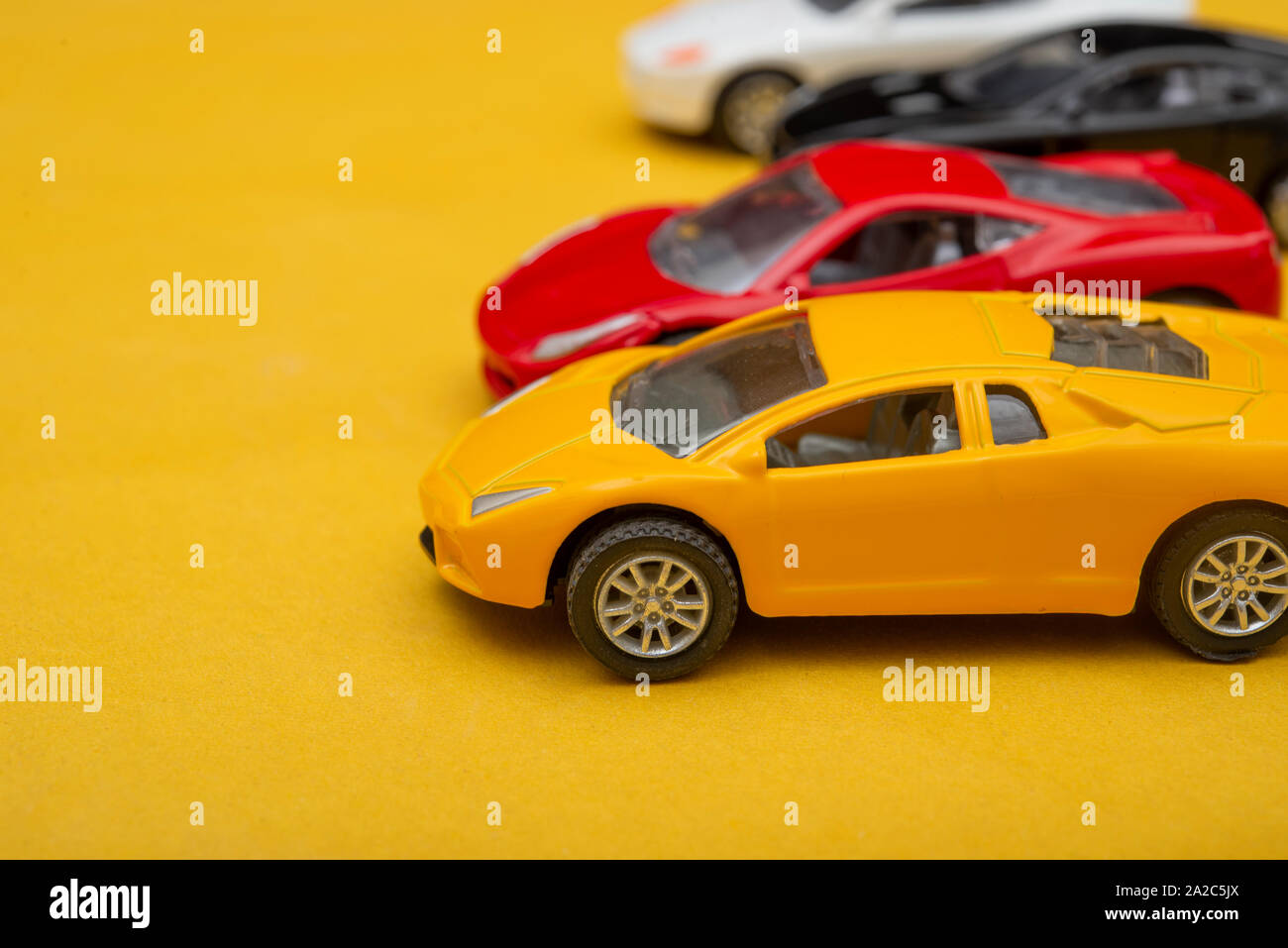 Collection of Multi Colored Modern Cars on yellow background Stock ...