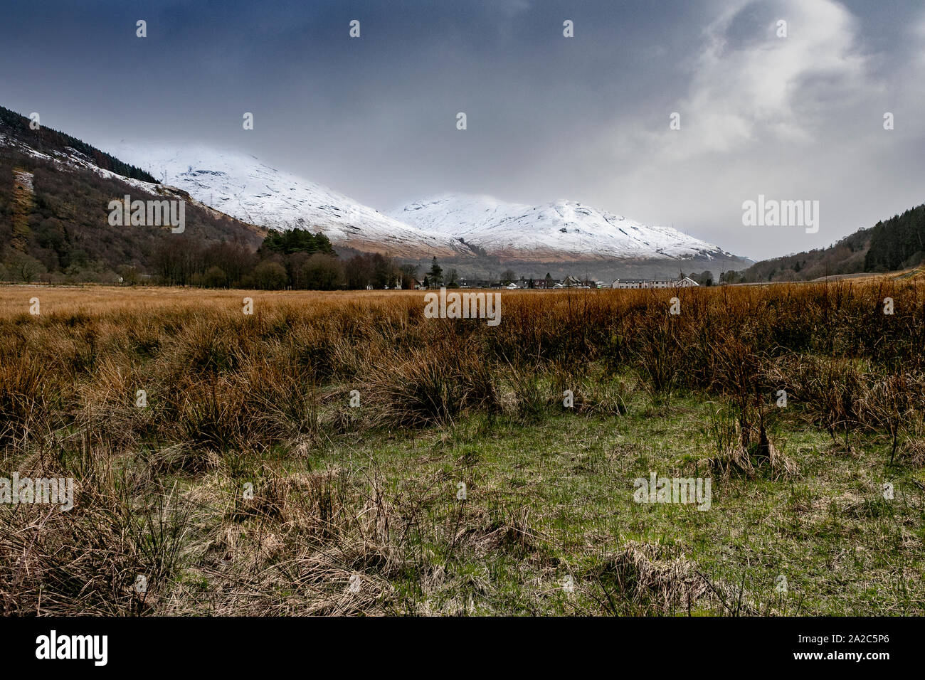 Scottish Highlands in winter snow-capped? hills and moody moorland ...