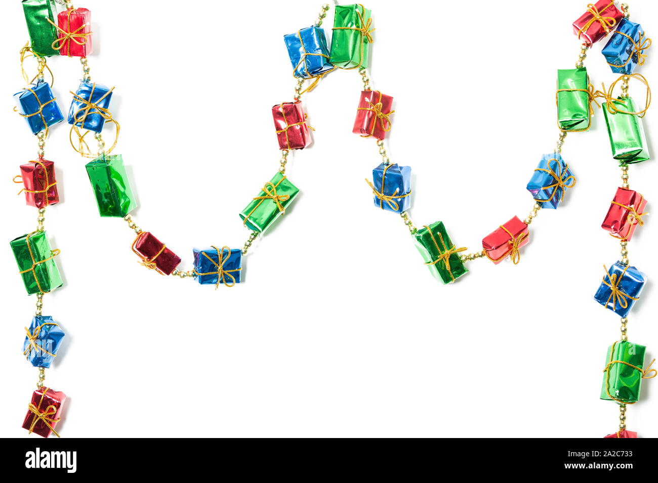 Bright christmas decoration of wrapped parcels against isolated on ...