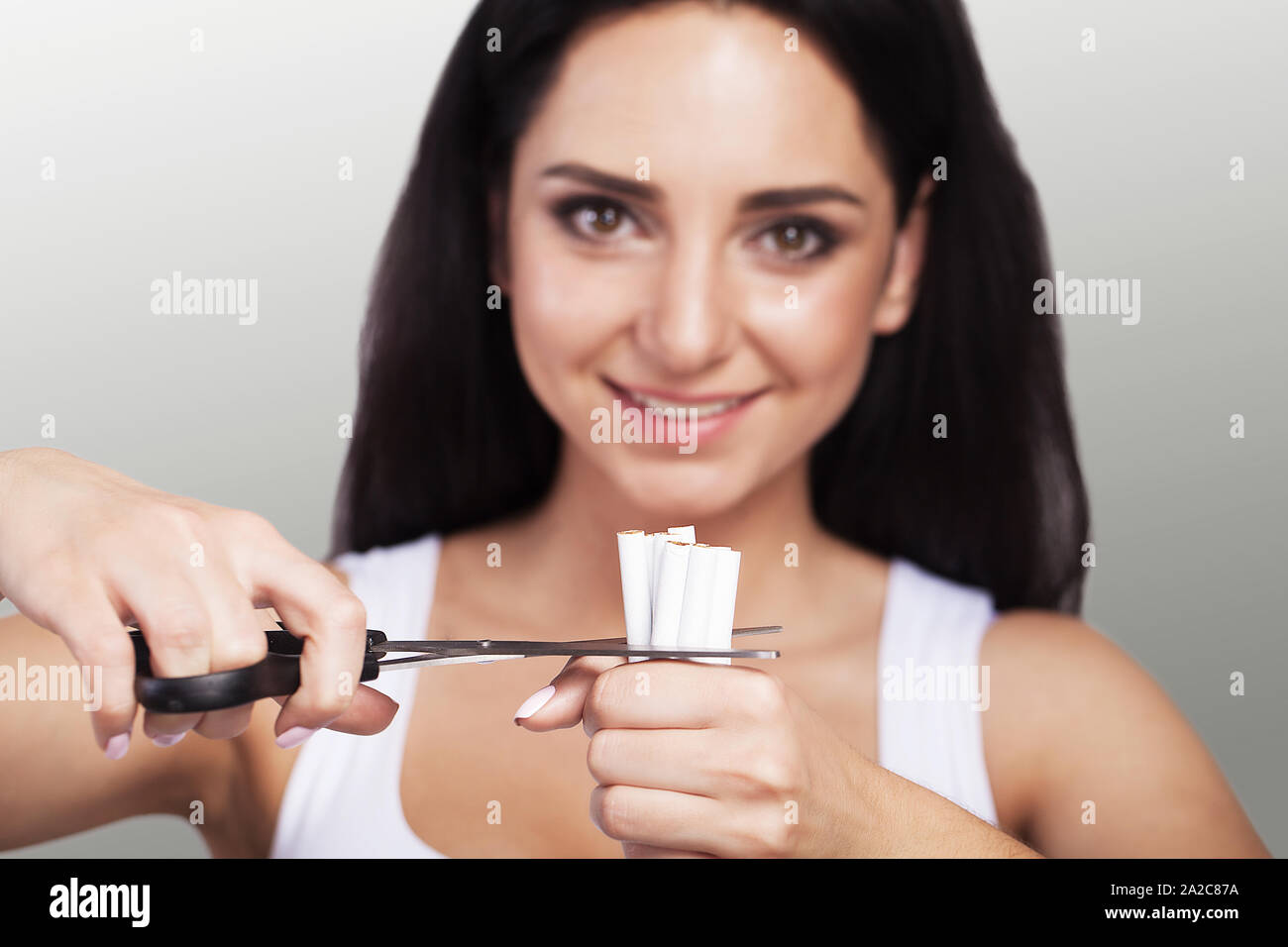 Quit Smoking. Closeup Of Female Hands Holding A Bunch Of Cigarettes And ...