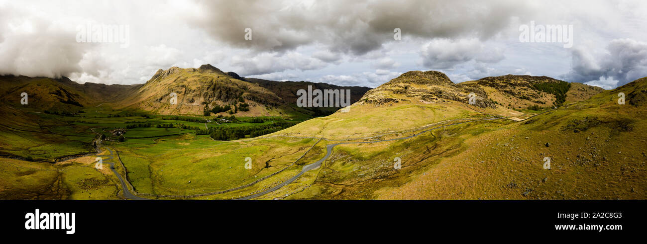 Aerial view looking over hills and fens towards mountains in the Lake ...