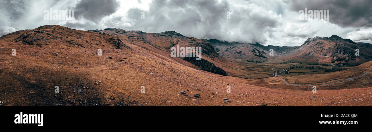 Aerial view looking over hills and fens towards mountains in the Lake ...
