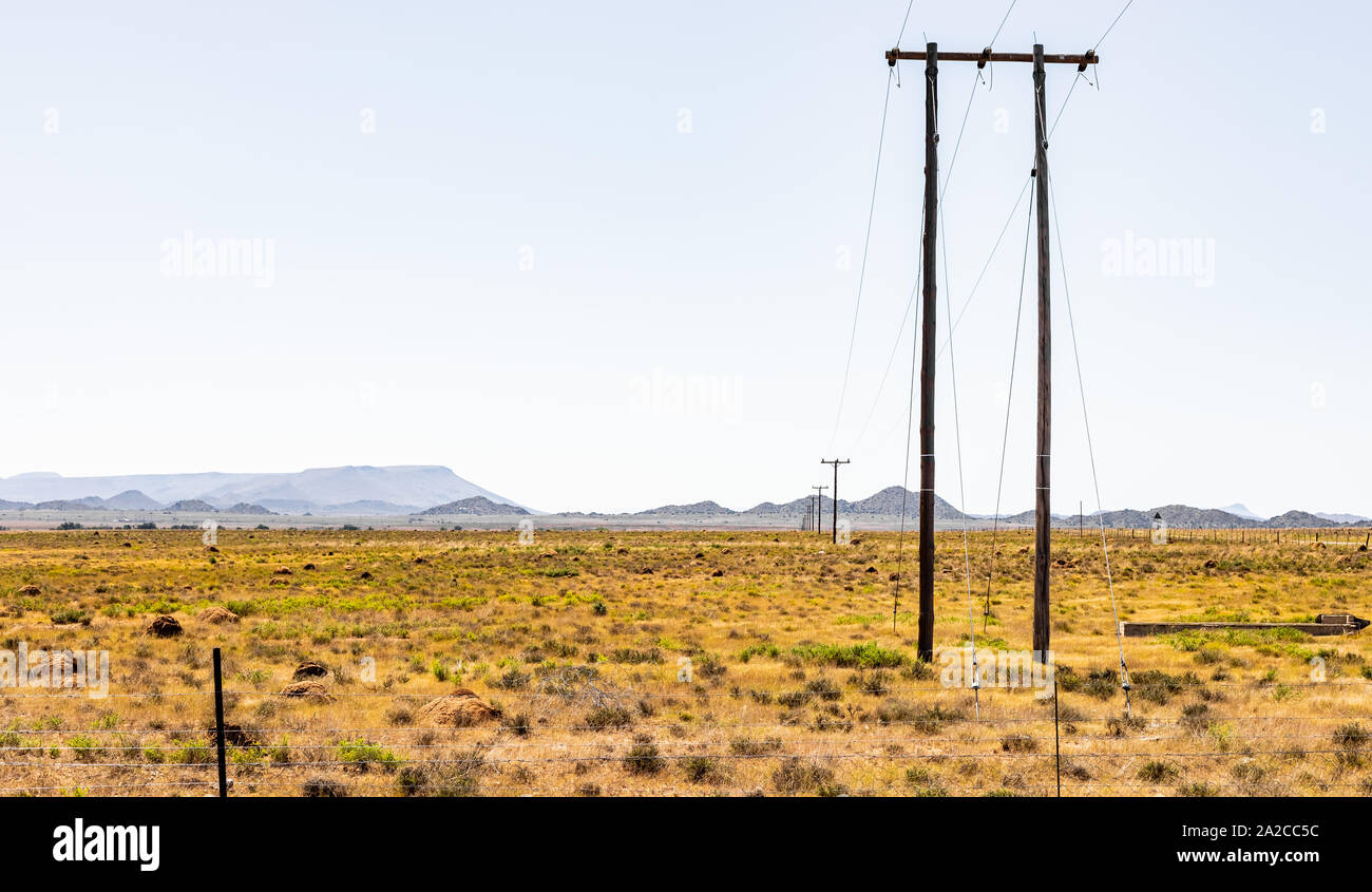 Power lines in Rural Grassland Farming Area of the Karoo Semi-desert in ...