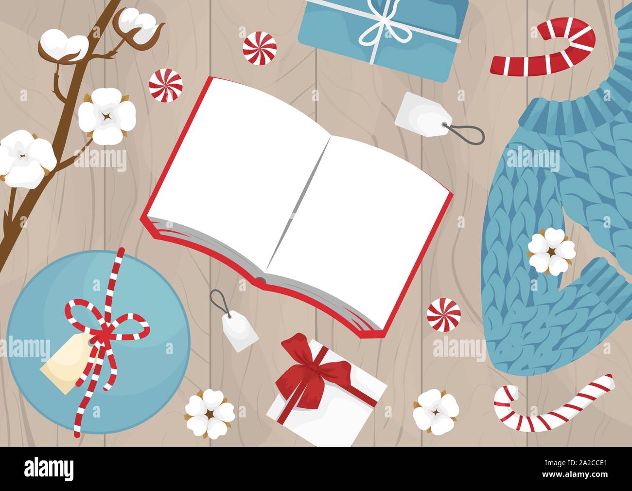 Flat lay wool sweater, book and gifts, branch and cotton flowers on ...