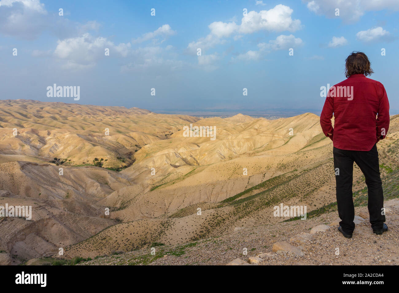 a man is looking in the Judean desert, Israel Stock Photo - Alamy