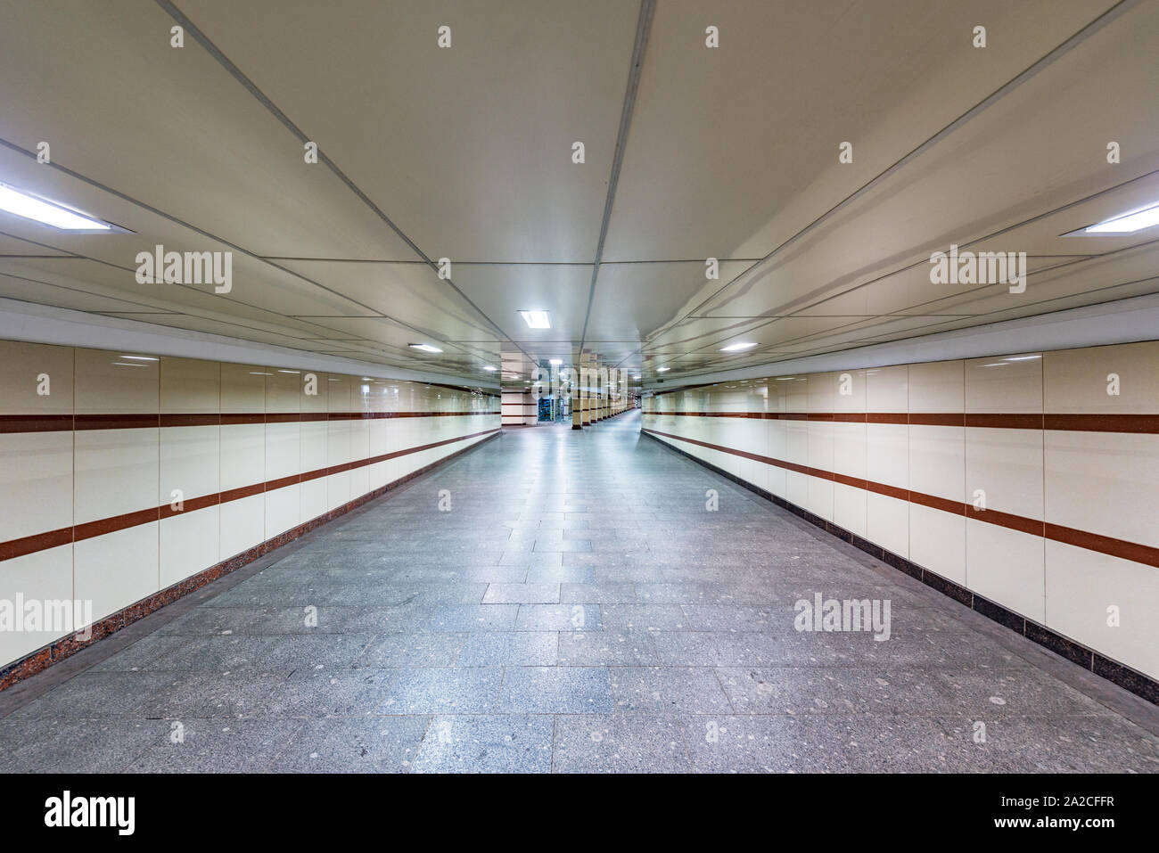 Empty long corridor under the big highway Stock Photo - Alamy