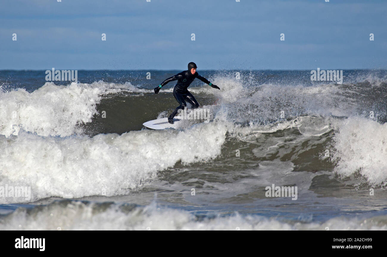 Belhaven Bay, Dunbar, Scotland, UK. 2nd October 2019. Surfer rides the ...
