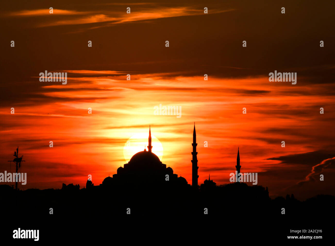 Cityscape of Istanbul with silhouettes of ancient mosques and minarets ...