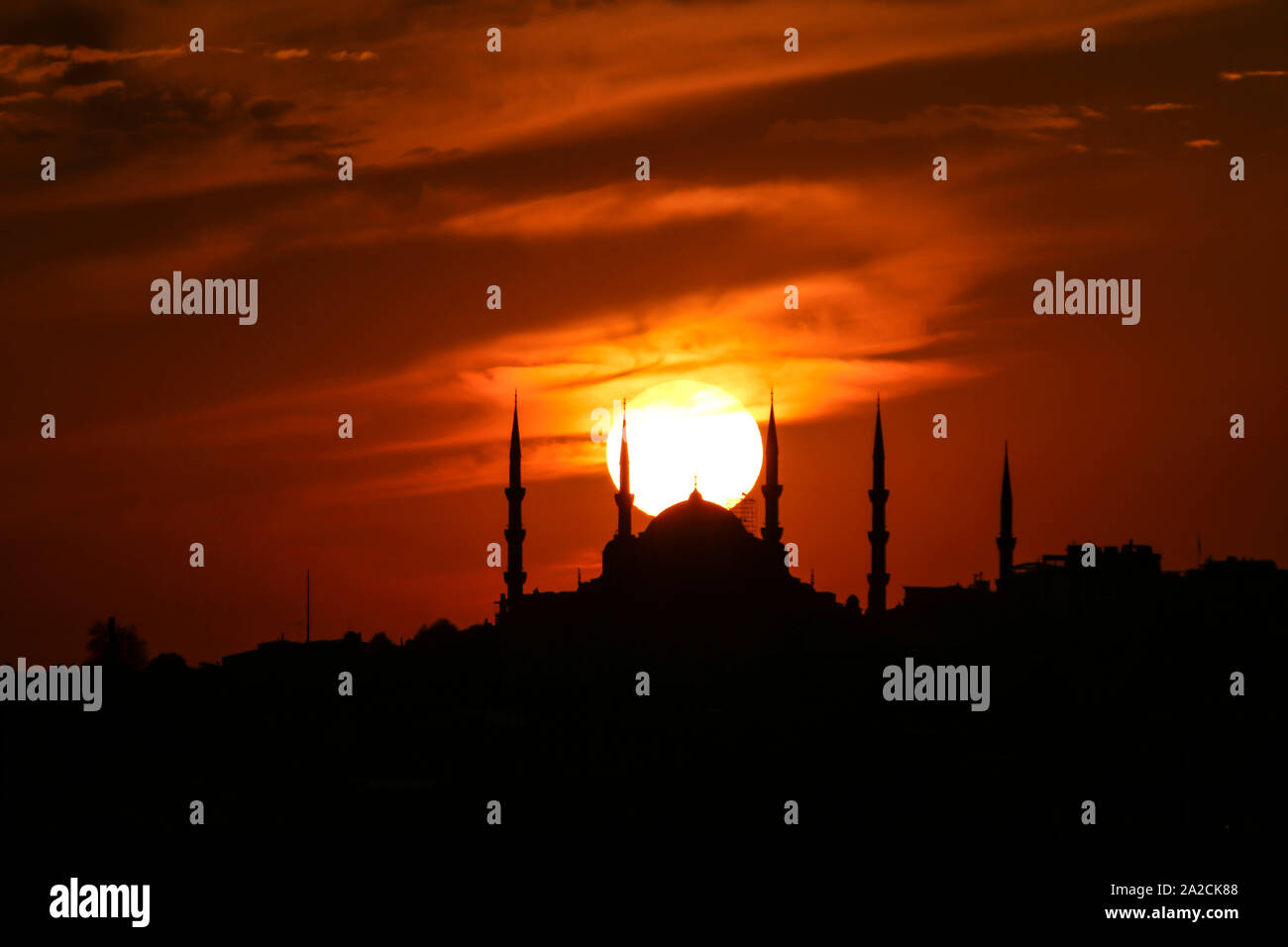 Cityscape of Istanbul with silhouettes of ancient mosques and minarets ...