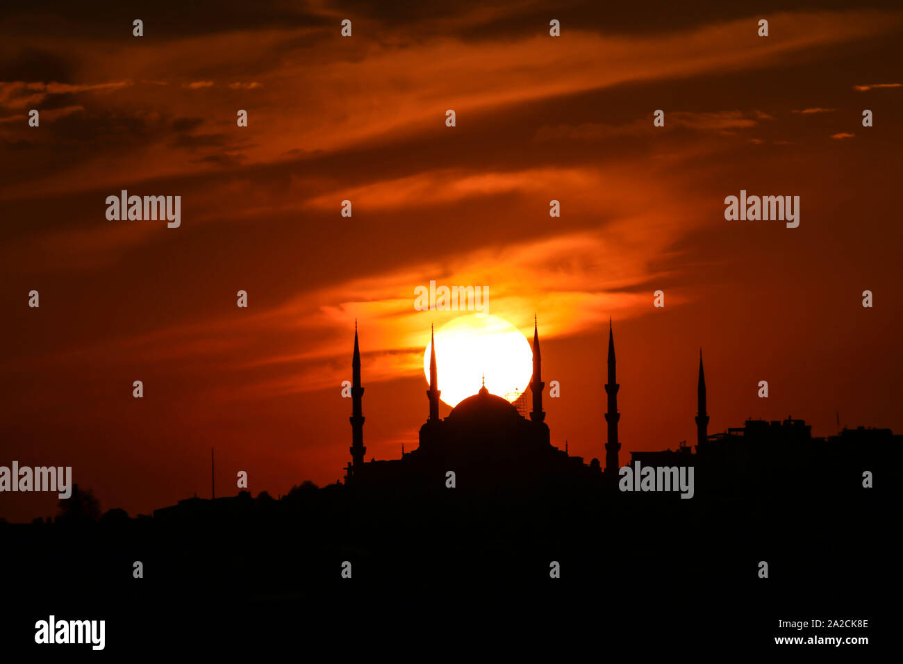 Cityscape of Istanbul with silhouettes of ancient mosques and minarets ...