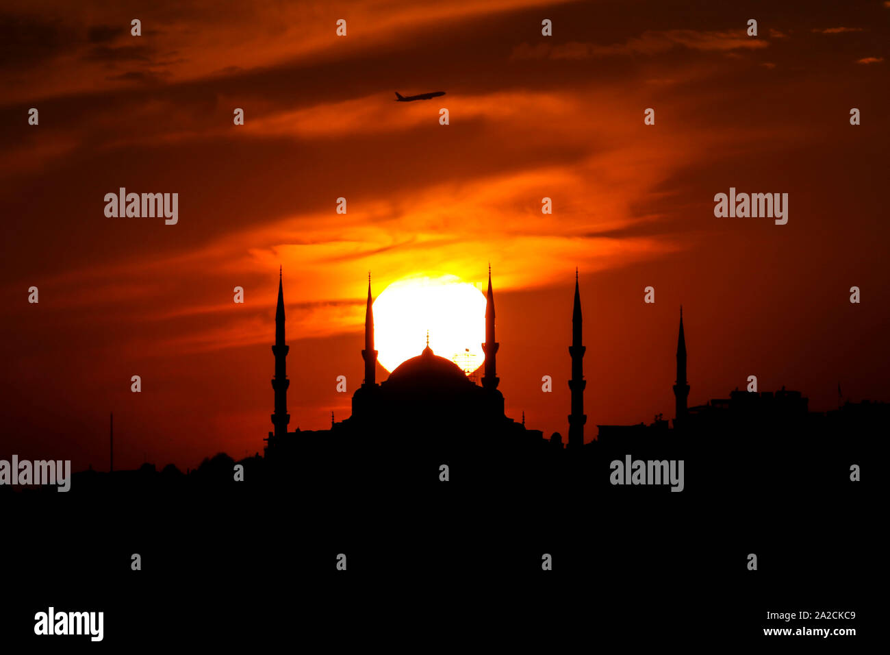 Cityscape of Istanbul with silhouettes of ancient mosques and minarets ...