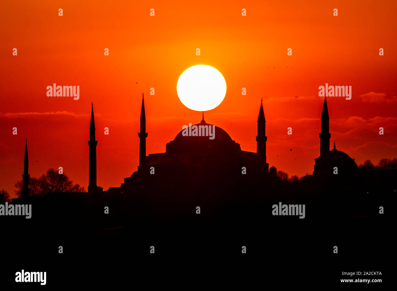Cityscape of Istanbul with silhouettes of ancient mosques and minarets ...