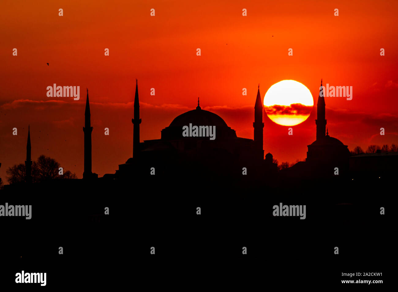 Cityscape of Istanbul with silhouettes of ancient mosques and minarets ...