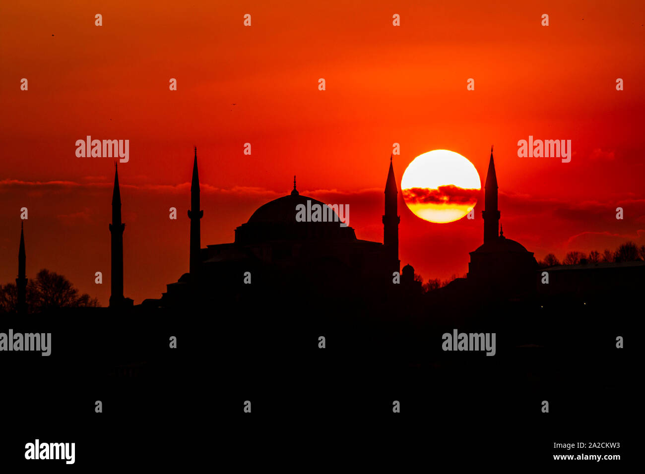 Cityscape of Istanbul with silhouettes of ancient mosques and minarets ...