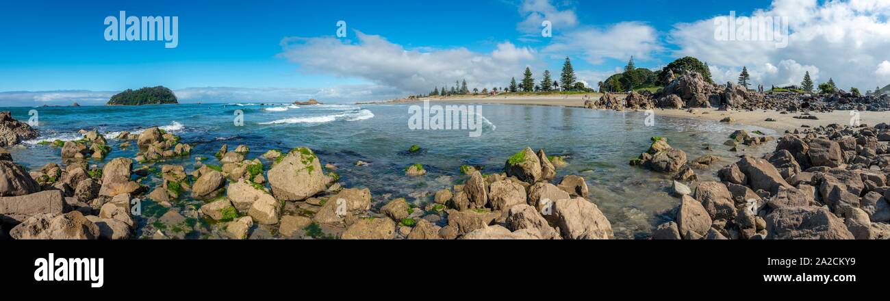 Sandy beach beach of Mount Manganui with island Motiti Island, Tauranga ...