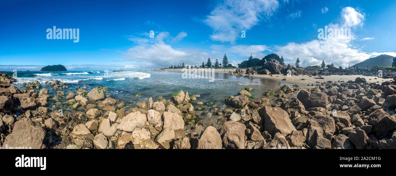 Sandy beach beach of Mount Manganui with island Motiti Island, Tauranga ...